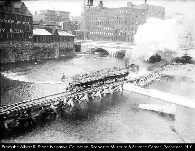 Working on the Genesee River, c.1915. Picture shows the Erie Canal Aqueduct, which later became ...